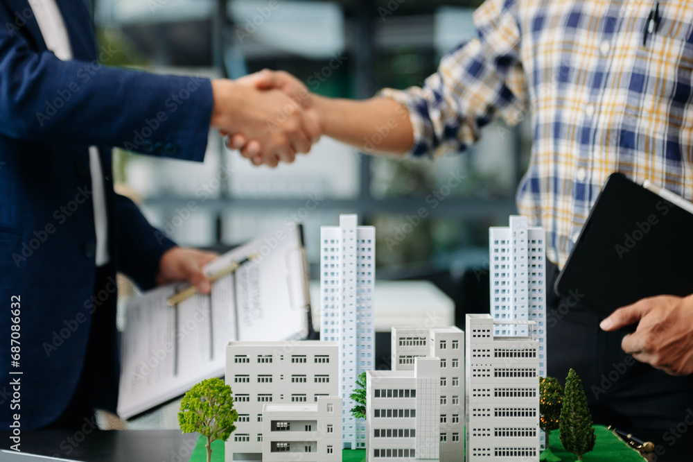 balancing the property sector The real estate agent is explaining the ...
