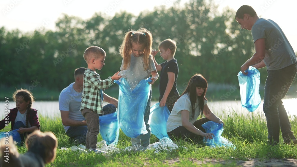 saving nature garbage collection. a group of volunteers save ...