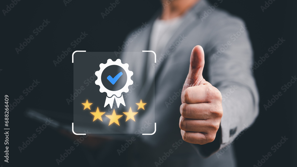 Hand with thumb up and shows the sign of the top service Quality ...