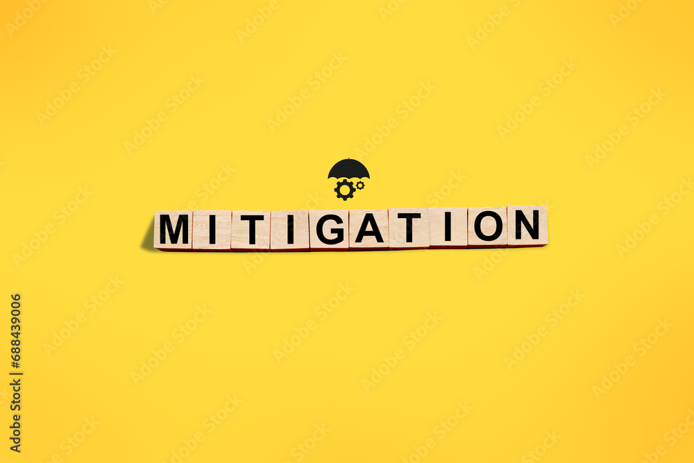 Mitigation text on wooden, business term の Stock フォト | Adobe Stock