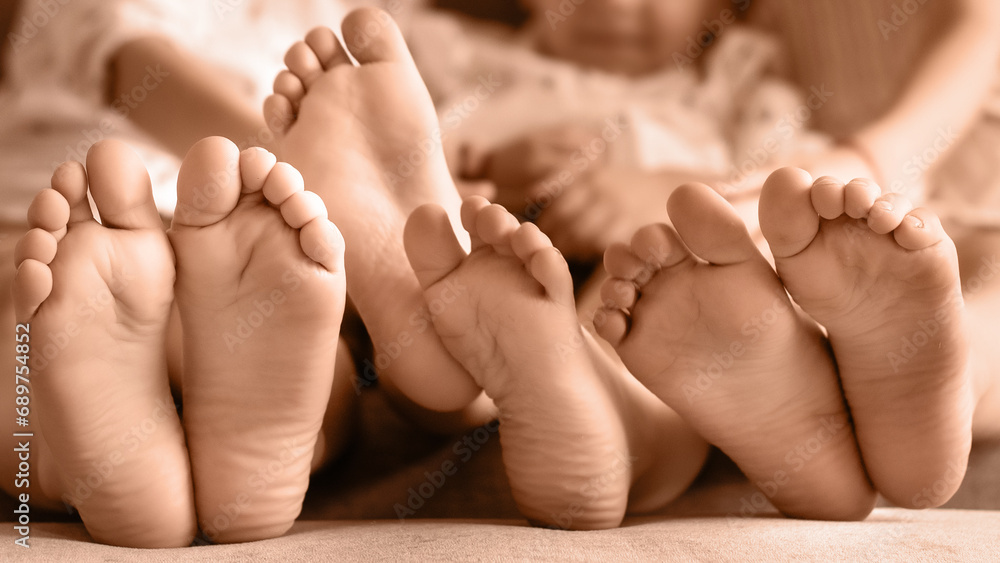 color of the year. Peach Fuzz. baby bare legs in the frame. barefoot ...