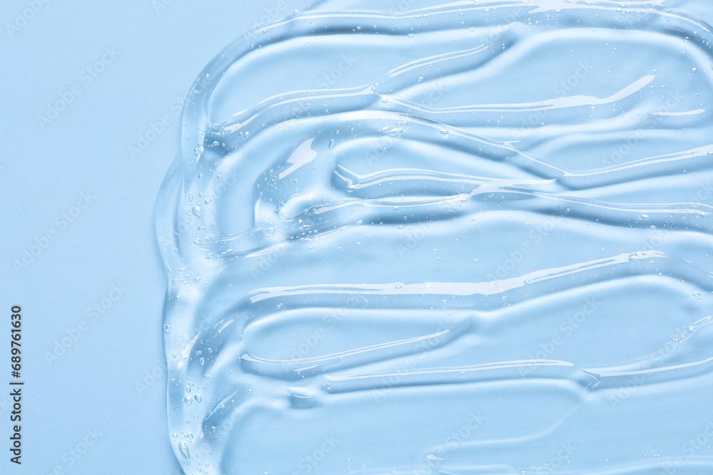 Transparent gel serum texture. Blue make-up and cosmetics background ...