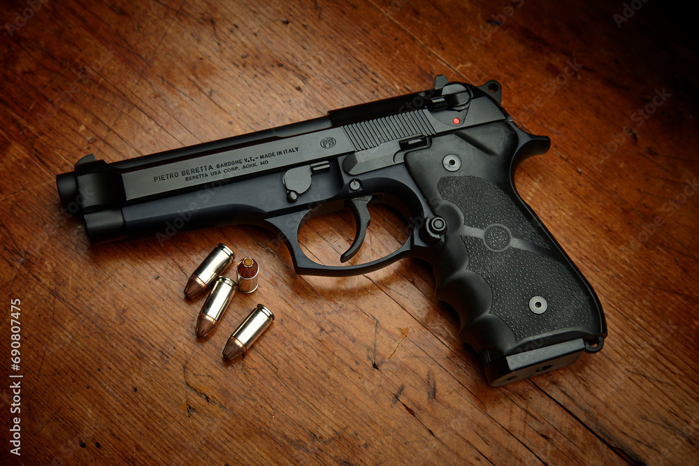 Beretta 92FS. 9mm semi-automatic handgun with custom Hogue grips. 115 ...