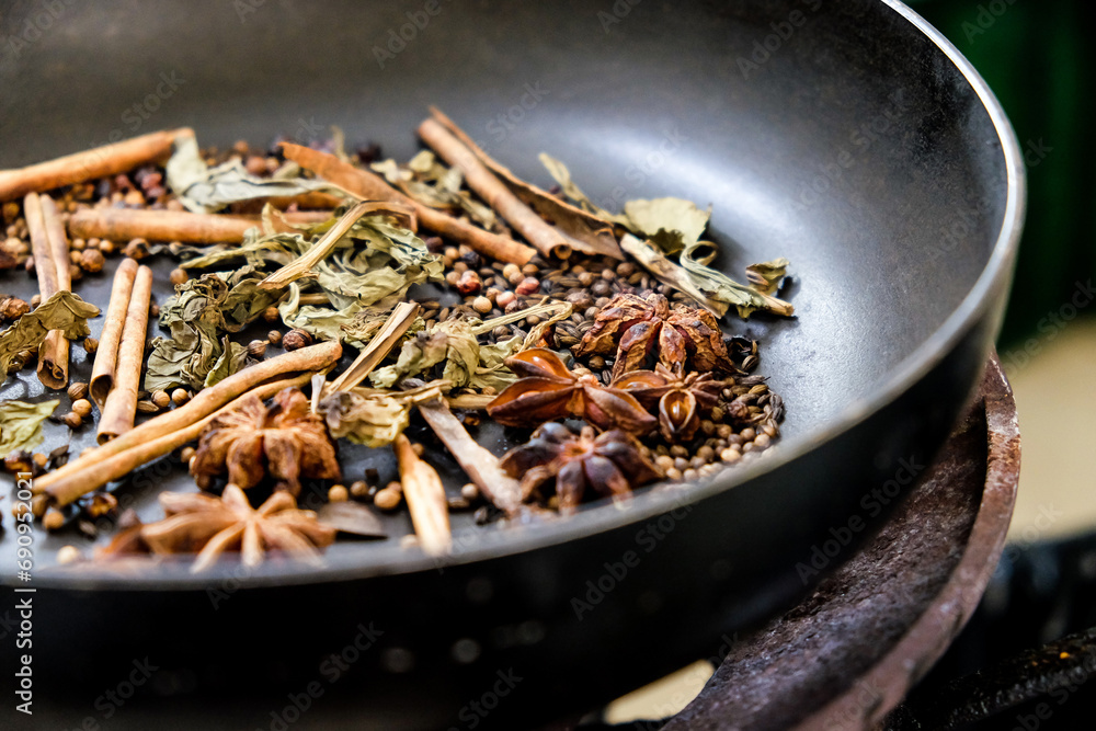 spices in a pan, A spice is a seed, fruit, root, bark, or other plant ...