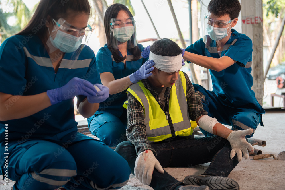 First aid team helped with a worker accident on construction site ...