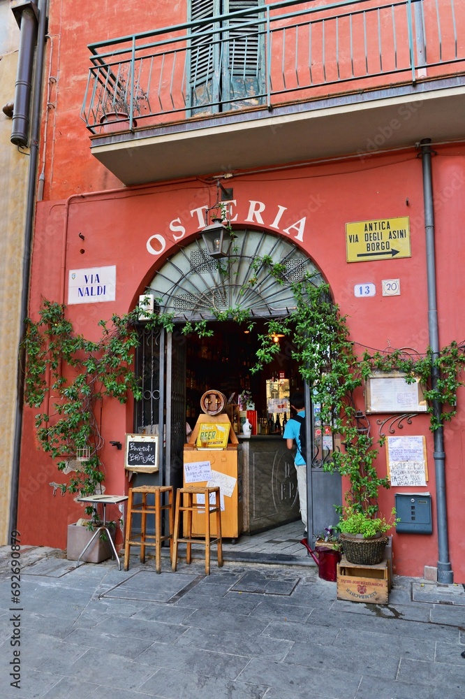 external view of a typical restaurant in the medieval village of ...
