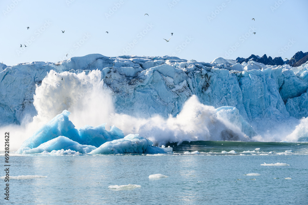 Dramatic ice calving from the Monacobreen Glacier in Liefde Fjord ...