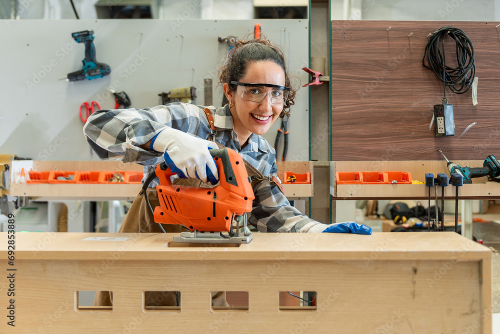Stock-Foto „Carpenter woman one smile young aged standing aim working ...