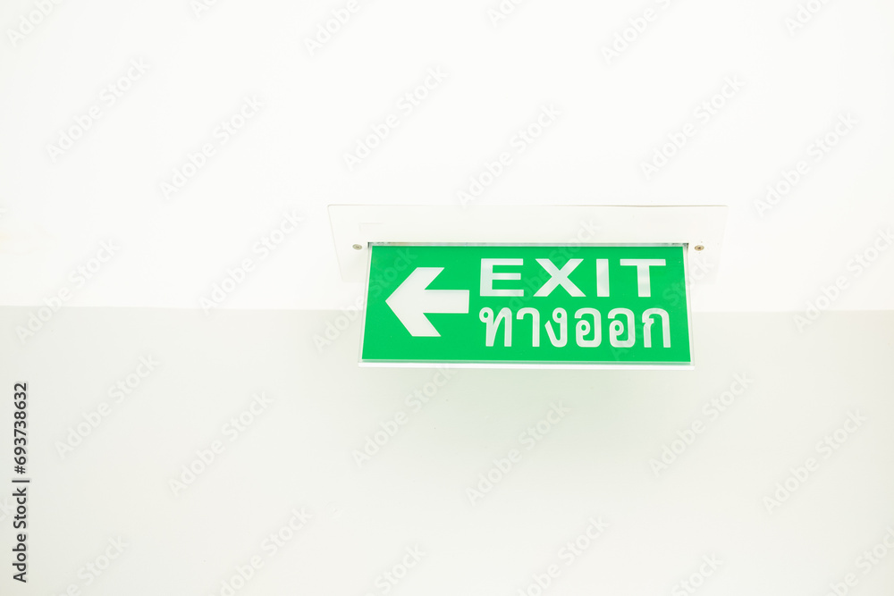 Stock-Foto „Green emergency exit sign green light box. Thai Letter is ...