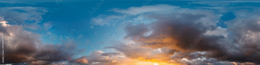 Sunset sky panorama with bright glowing pink Cumulus clouds. HDR 360 ...