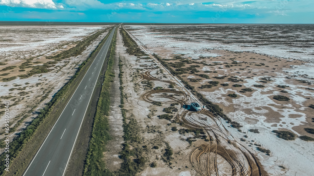 4wd truck spinning in a salt flat leaving traces off road concept Stock ...