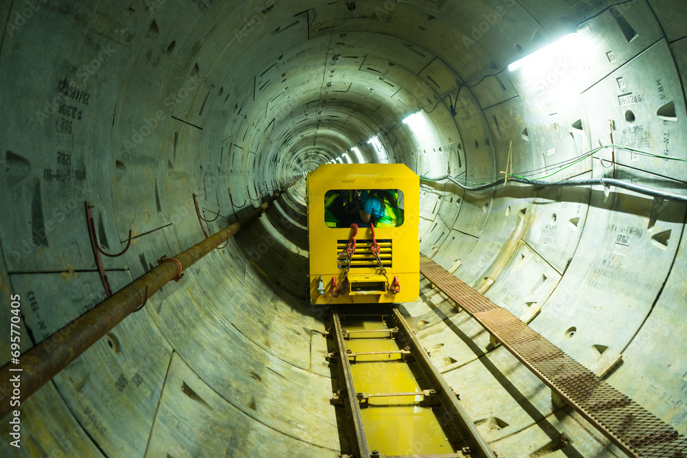 Train for walking to railway underground station at construction site ...