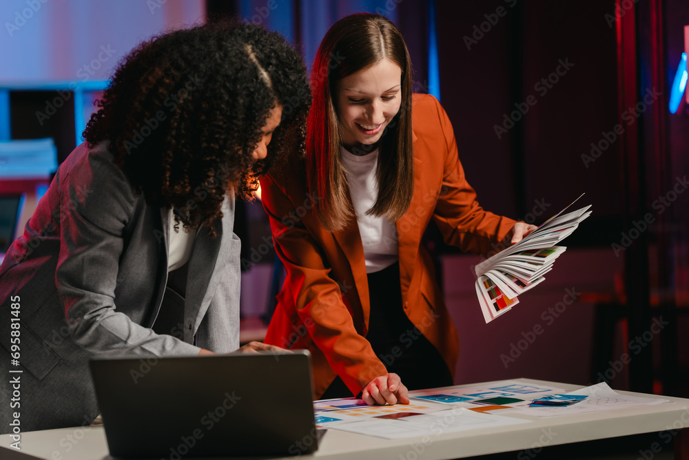 African American business worker with an afro presenting a UX,UI design ...