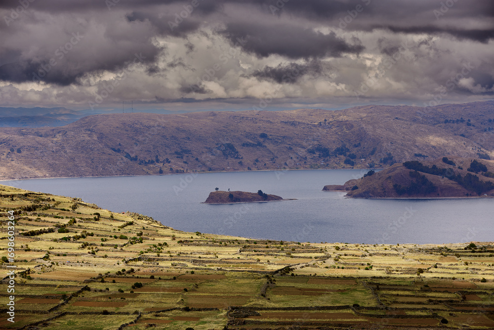 Lake Titicaca is a large, deep lake in the Andes on the border between ...