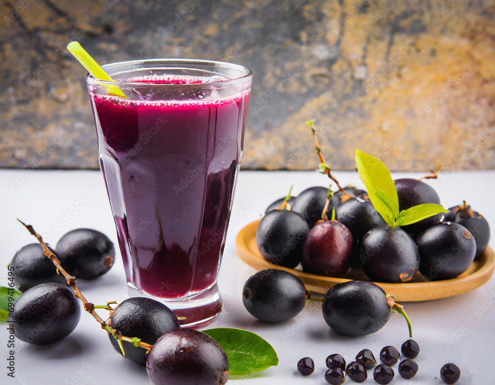 Photo Stock Juice of jamun fruit in a glass also called as java plum ...