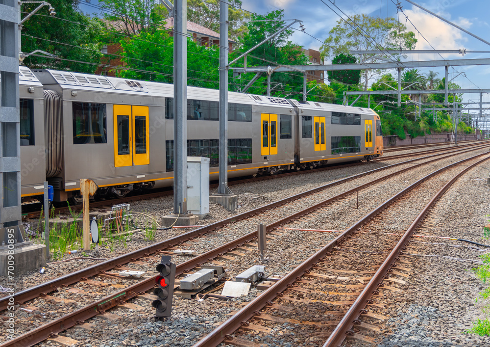 Commuter Train fast moving through a Station in Sydney NSW Australia ...