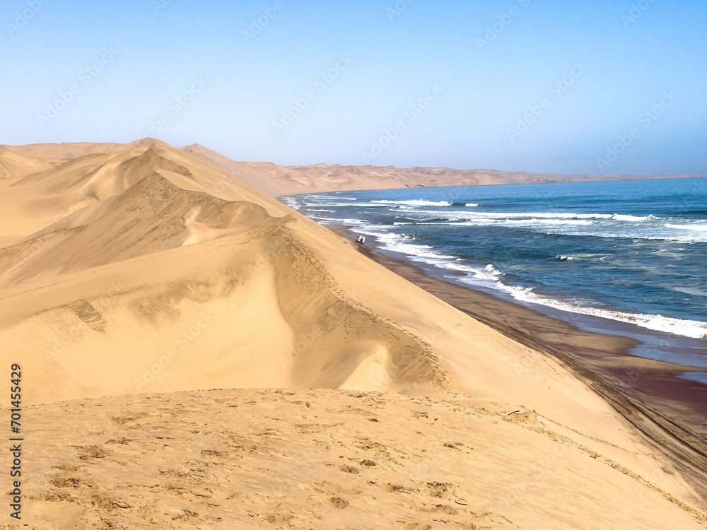 Sandwich Harbour, Namibia - August 22, 2022: A stunning landscape where ...
