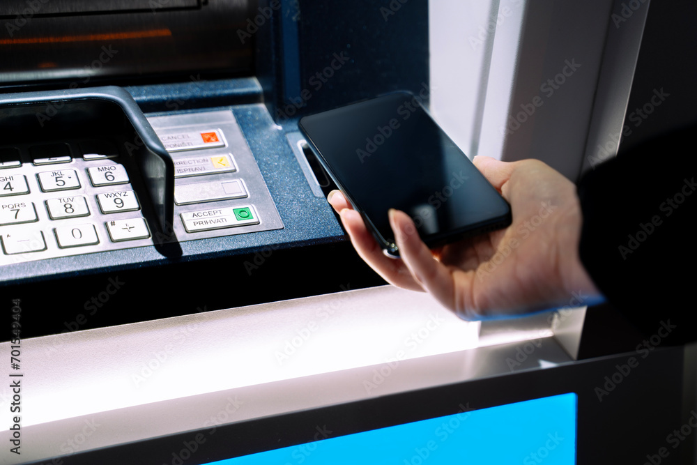 Wireless ATM transaction concept, using wifi or code scanning to use ATM Stock Photo | Adobe Stock