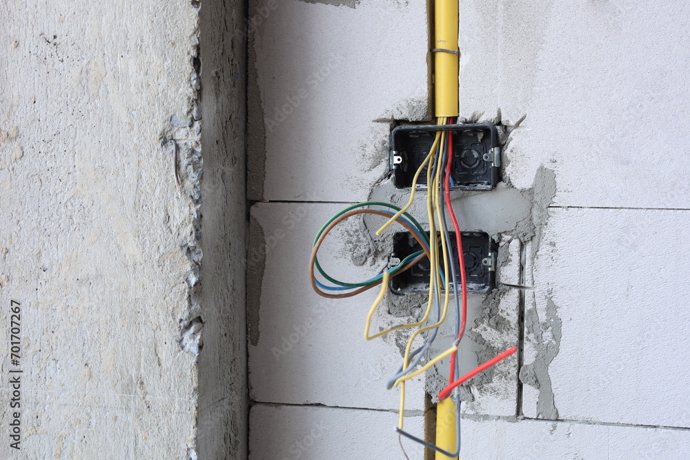 Holes in the wall for sockets with wires. Installation of sockets on ...