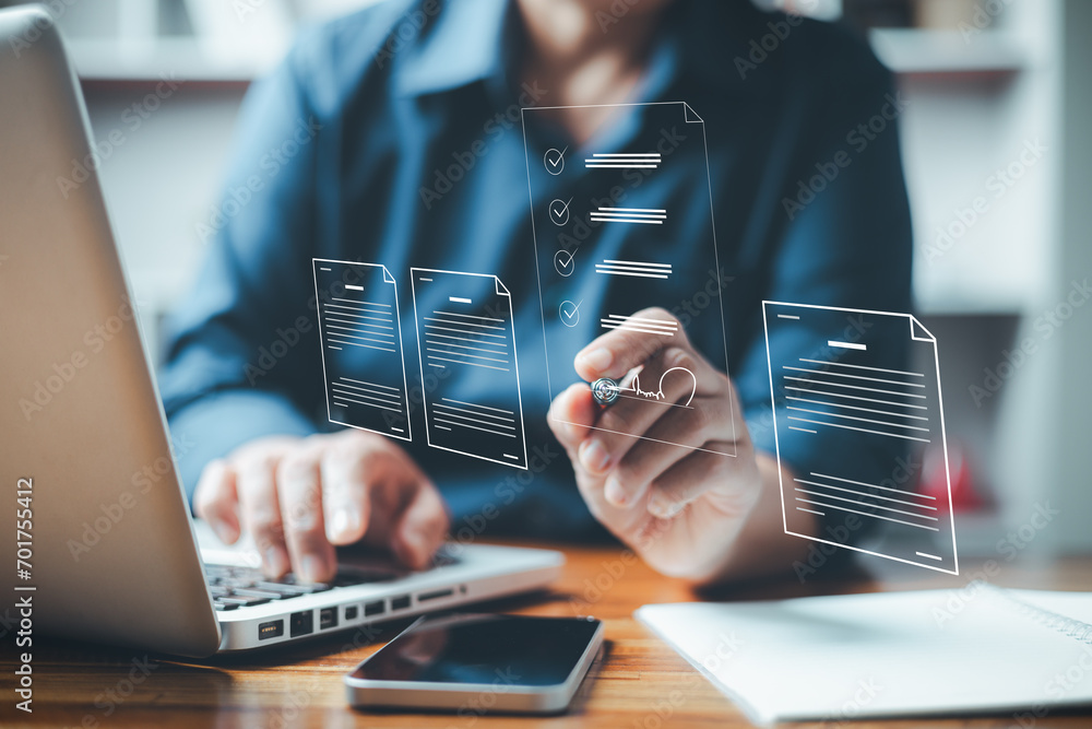 Foto de Stock Businesswoman using digital device signs electronic ...