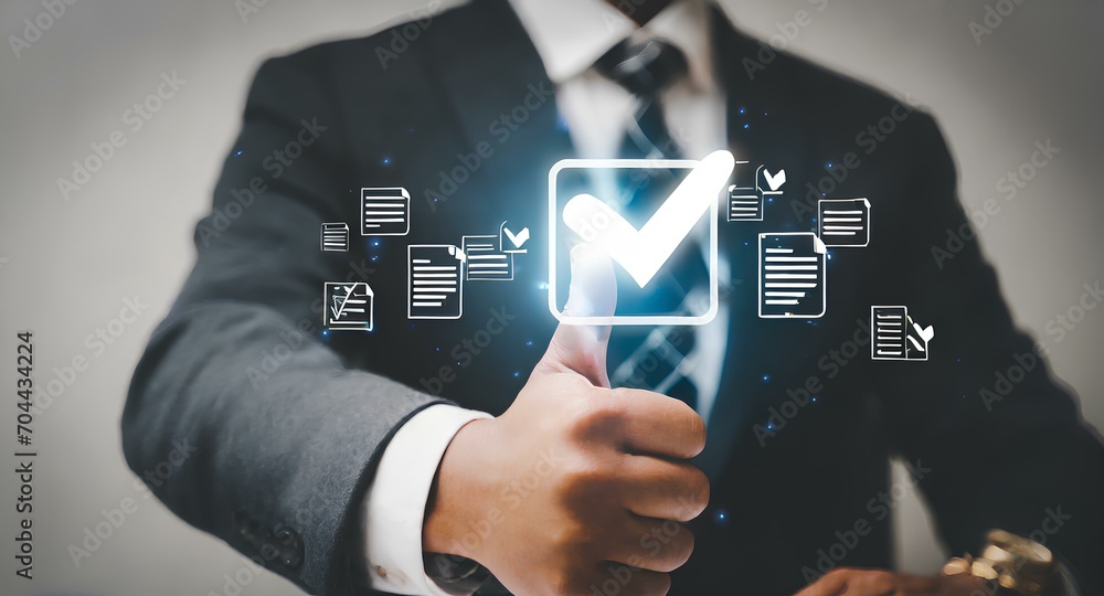 Stock-Foto „Businessman hand thumb up and virtual correct sign or tick ...