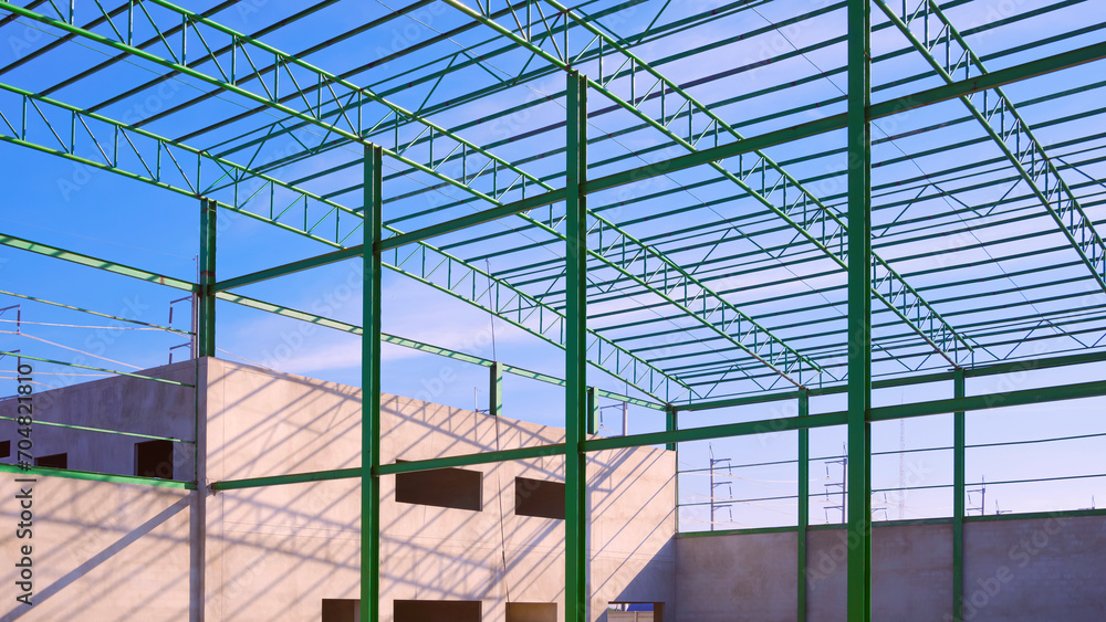 Stock-Foto „Green metal columns and roof beam outline with concrete ...
