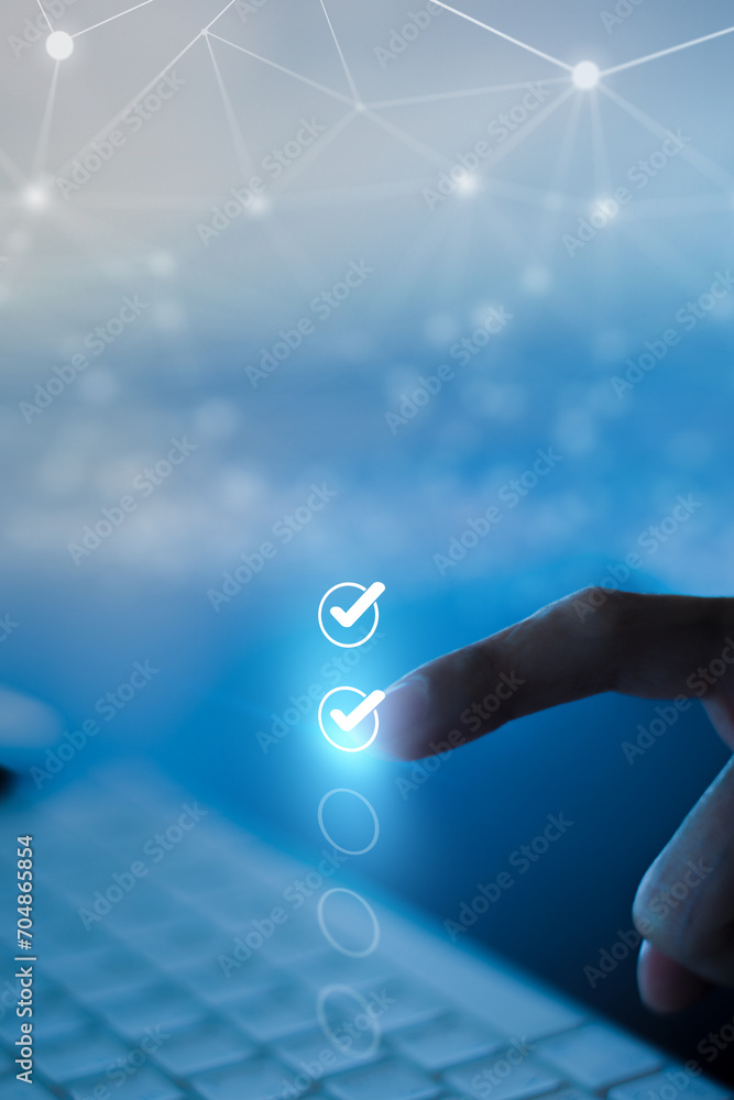 Businesswoman using pen to tick correct sign mark in checkbox for ...