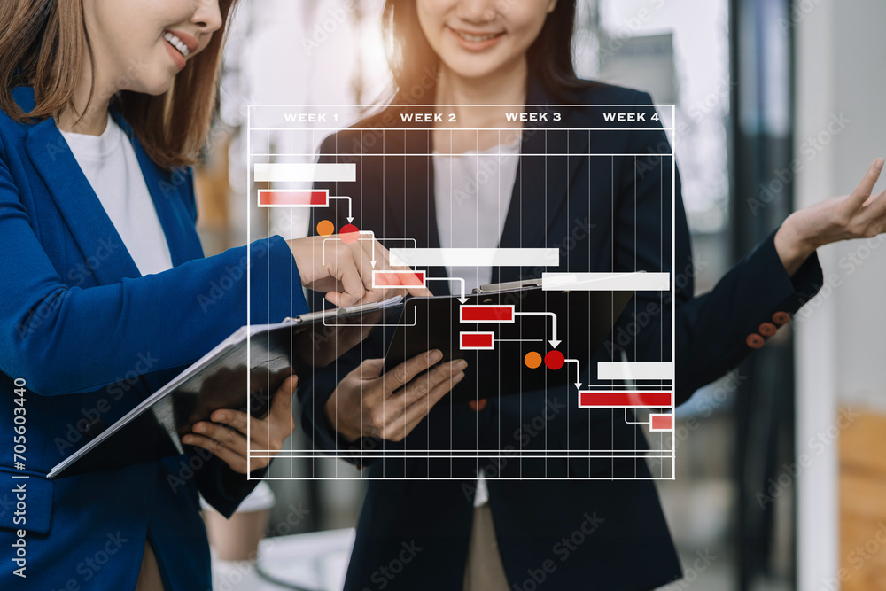 Business woman hand Project manager working and update tasks and Gantt ...