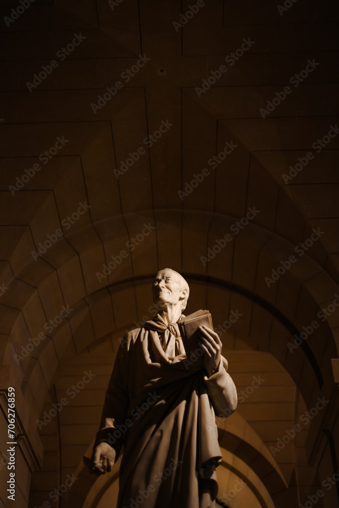 The statue monument of Voltaire, a French Enlightenment writer ...