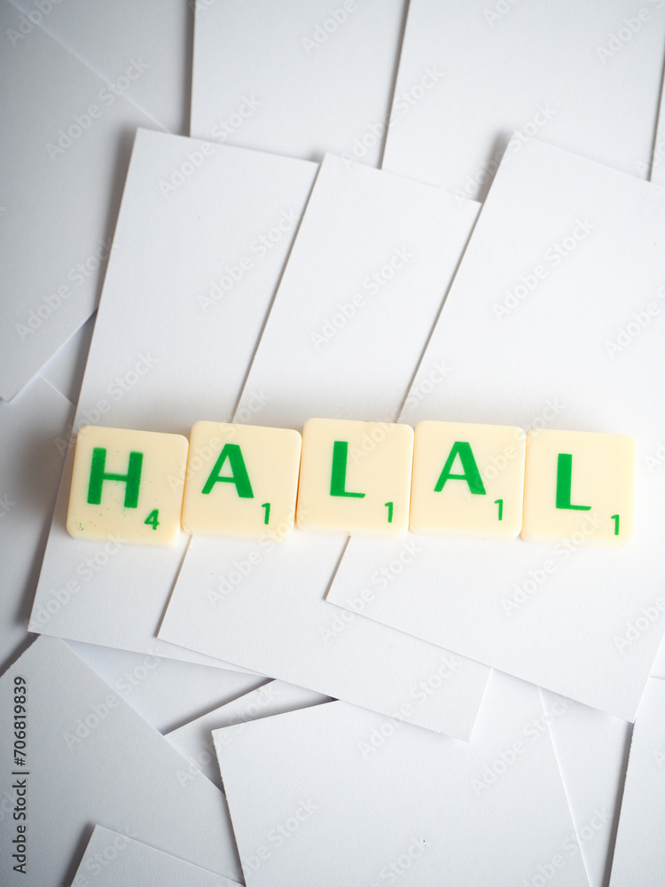 Scrabble letters spelling words HALAL. Halal is an Arabic word that ...