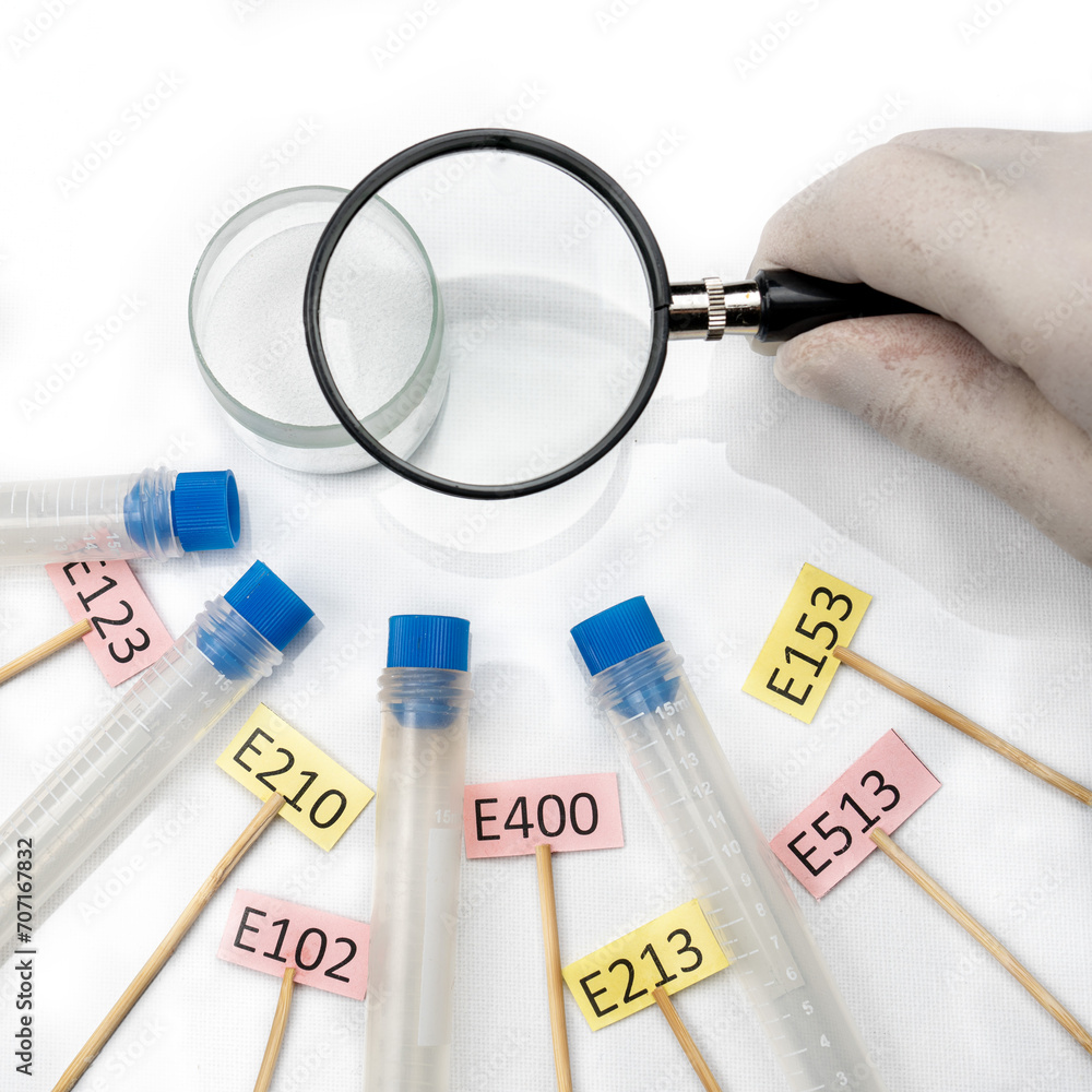 There is a magnifying glass in the laboratory assistant s hand, there ...