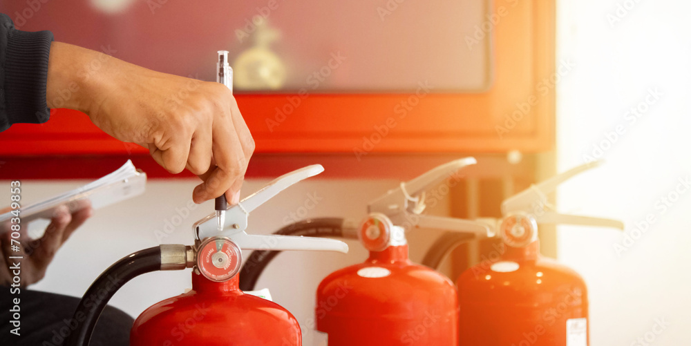 Engineer check fire suppression system,check fire extinguisher tank in ...