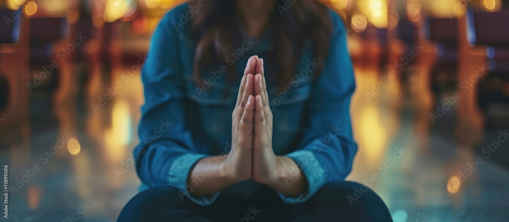 Female hands in prayer position in church, showing humility, faith in ...