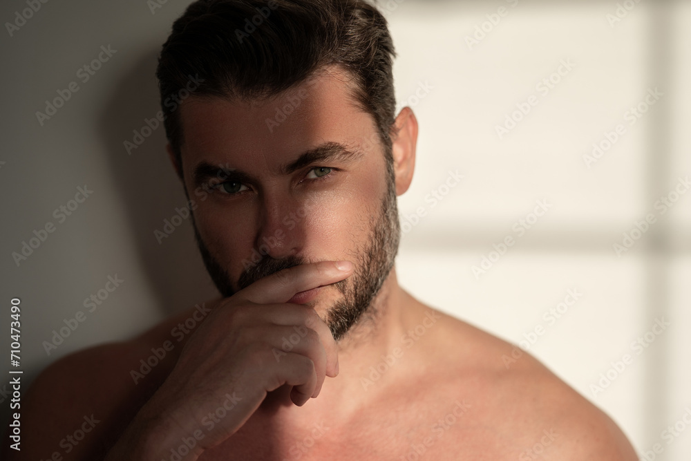 Sexy shirtless man close up portrait care of skin, isolated over white ...