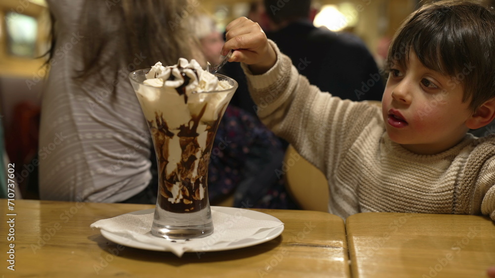 Little Brother and Sister Enjoying Ice Cream Sundae with Whipped Cream ...