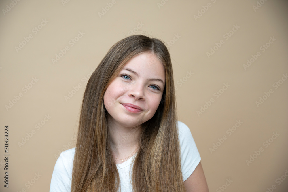 beautiful, cool, cute tween, teenager girl with long hair is posing in ...
