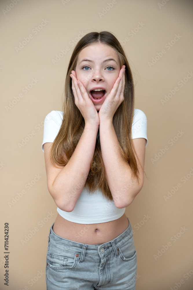 beautiful, cool, cute tween, teenager girl with long hair is posing in ...