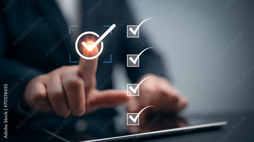 Check list concept.Businessman using tablet with online checklist ...