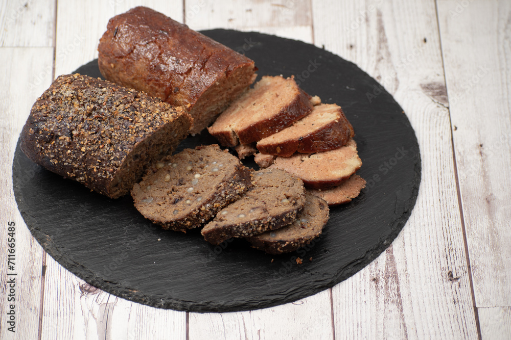 Vegan sausages made of vital wheat gluten and chickpeas, spices. Filled ...