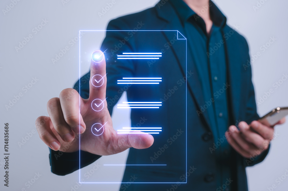 businessman pressing on virtual document checklist and clipboard task ...