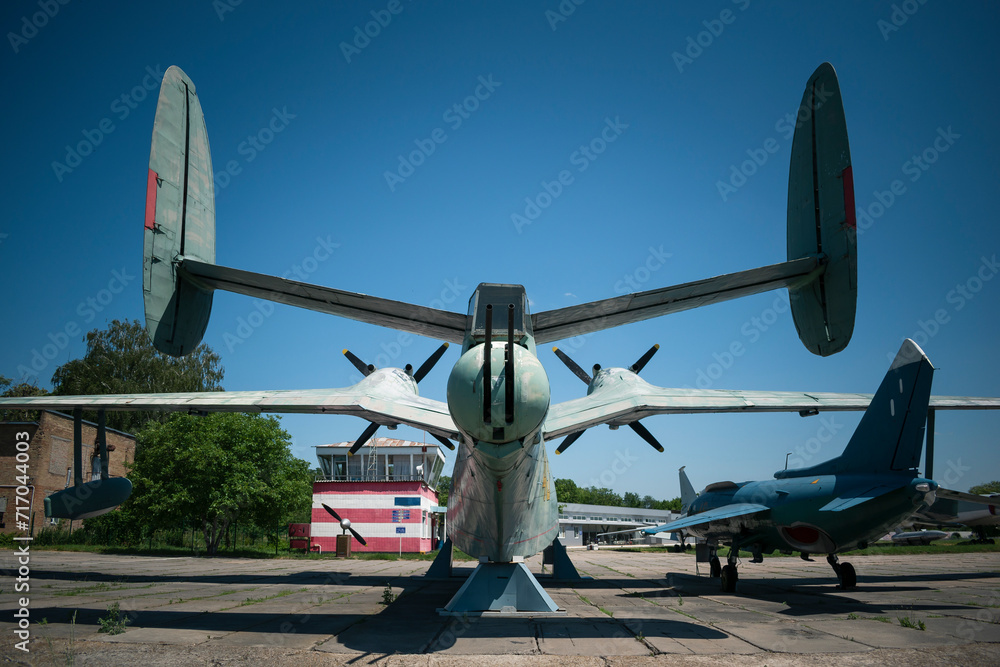 guns of a military aircraft. plane landing on the water. the plane is ...