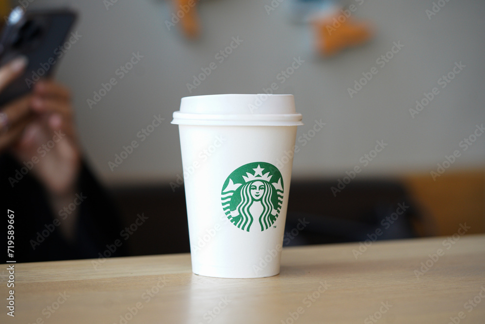 Foto de Stock A small Starbucks coffee in a Starbucks coffee shop ...