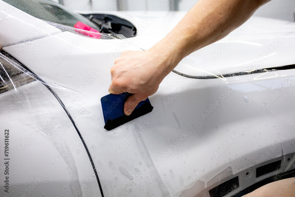The process of installing PPF on a car. PPF is a protective film for ...