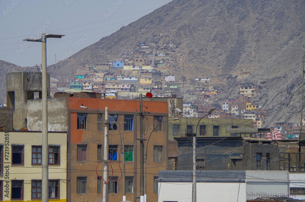 Poverty and crime make the colorful favelas of Lima, Peru a photogenic ...