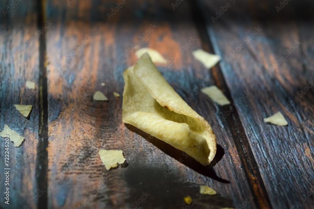 Keripik talas or taro chips is made of deep fried thin slice taro ...