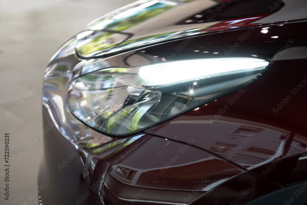 Tesla car model Y in cherry red color in Studio, electric vehicle in ...