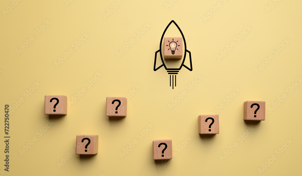 Stock-Foto „Glowing lightbulb inside of rocket take off from question ...