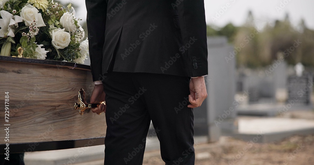 Coffin, hands and man walking at funeral ceremony outdoor with ...