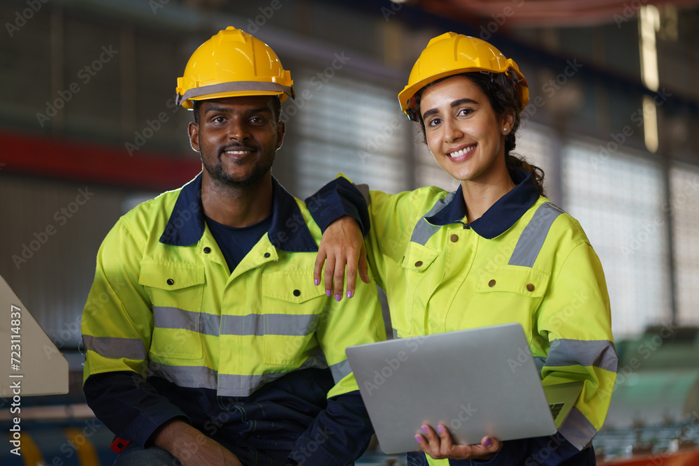 Engineer, Workers in a busy warehouse engage in various tasks ...