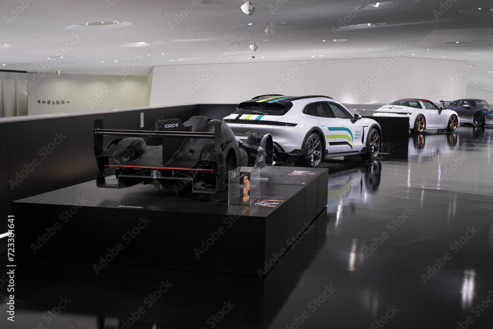 old and new sports cars Porsche rear view, racing and electric cars in ...